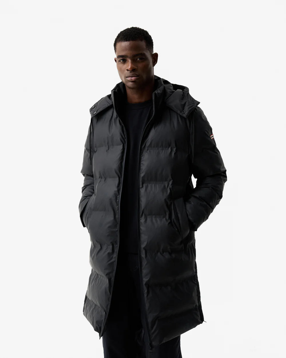 Hunter Men's Bretton Sonic Welded Pu Puffer Coat in Black | Anna Davies